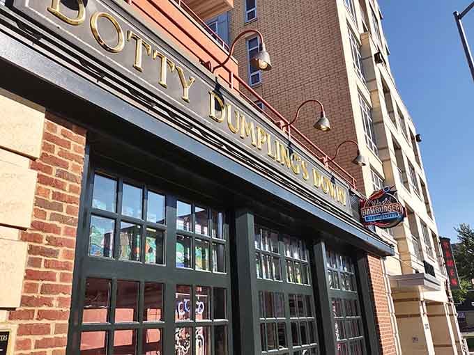 That neon marquee isn't just announcing a restaurant &ndash; it's broadcasting a burger revolution to Capitol Square.
