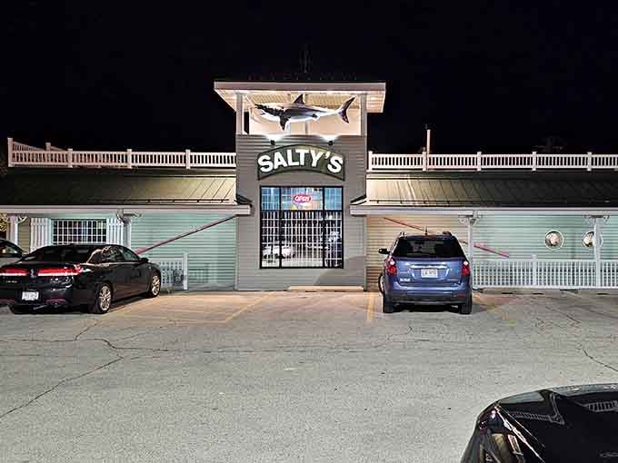 Even at night, Salty's glows like a beacon calling you to warmer shores, complete with a shark keeping watch overhead.
