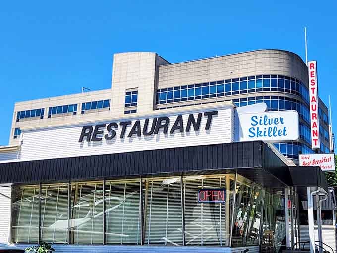 That curved architecture and neon signage aren't just retro&mdash;they're a time machine you can actually walk into.