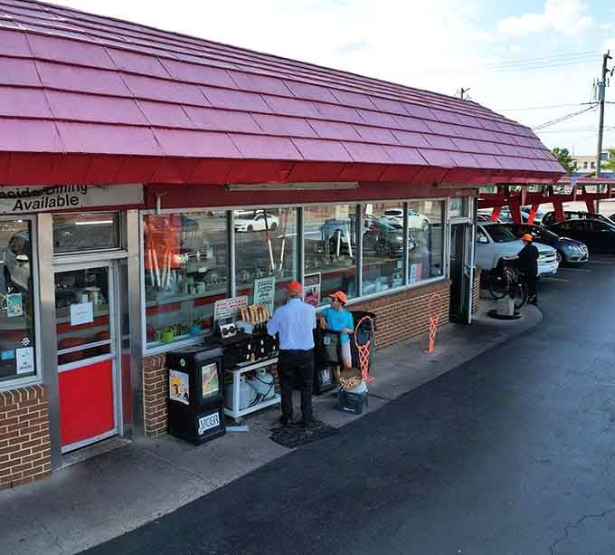 The curb service setup looks like a movie set, except the food is real and infinitely better.