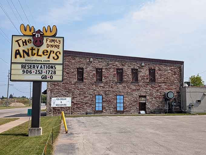 That cheerful moose sign isn't just advertising, it's making a promise about the delightful chaos waiting inside.