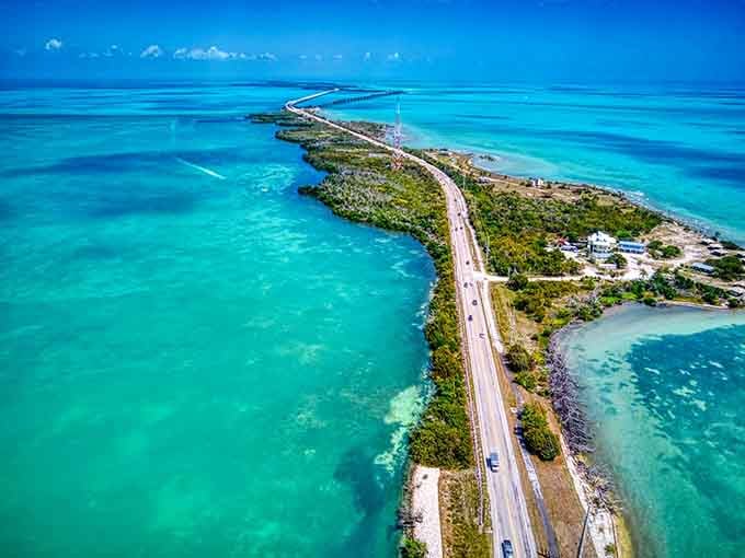 This aerial view captures what happens when someone decided building a highway across the ocean was actually a reasonable idea.