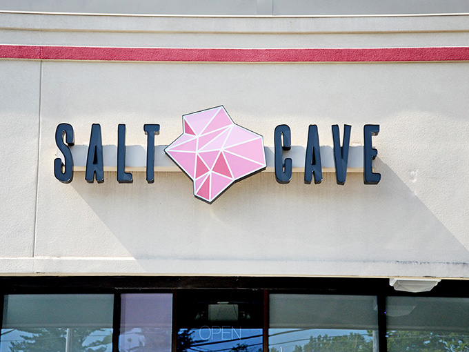 That pink geometric crystal logo isn't just pretty, it's your first hint that something wonderfully unusual awaits inside.