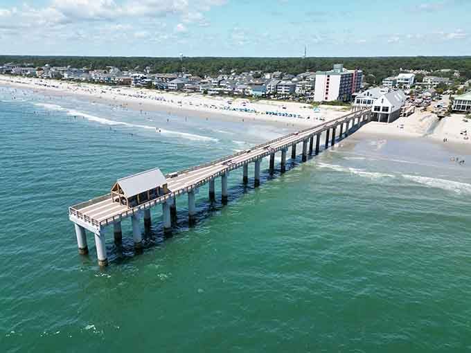 The pier reaches into the Atlantic like it's trying to shake hands with every fish in the ocean.