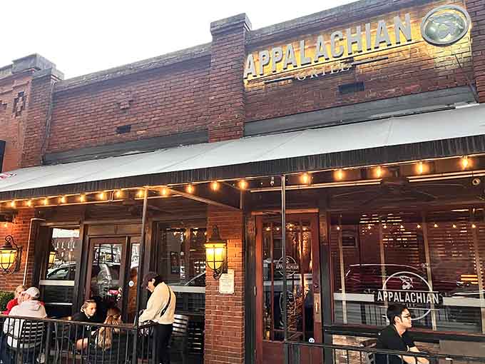 That brick facade and those twinkling lights are basically saying "come on in, we've been waiting for you."