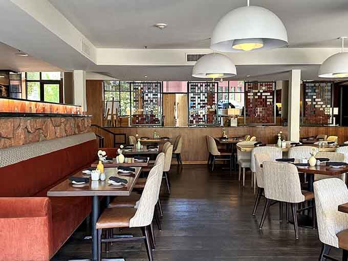 Contemporary elegance meets Southwest charm in a dining room designed to complement, not compete with, nature's masterpiece.