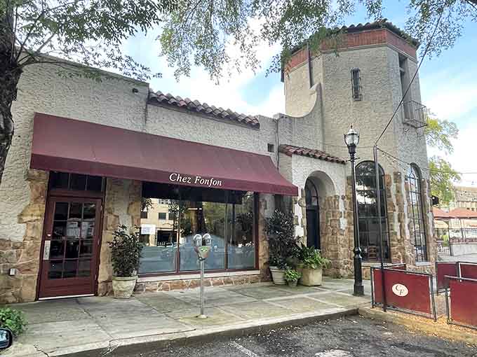 That burgundy awning isn't just decoration, it's a beacon calling you toward French culinary bliss in Alabama.