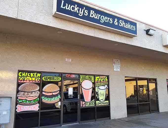 That blue sign isn't just marking a location, it's pointing you toward burger enlightenment in Phoenix.