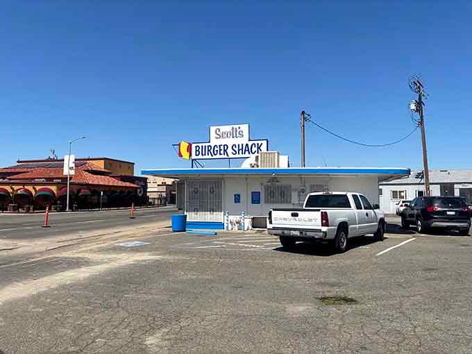 Classic roadside architecture meets serious burger business under that perfect California blue sky.