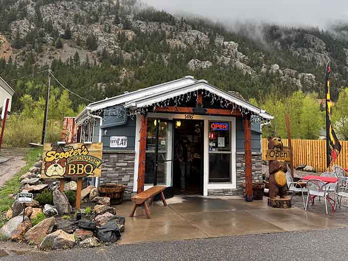 That wooden bear isn't just decoration, it's the bouncer making sure only serious barbecue lovers enter this mountain sanctuary.