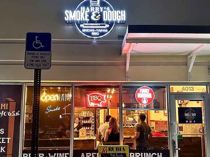 That glowing neon sign isn't just calling you in, it's practically begging you to experience Miami's smokehouse secret.