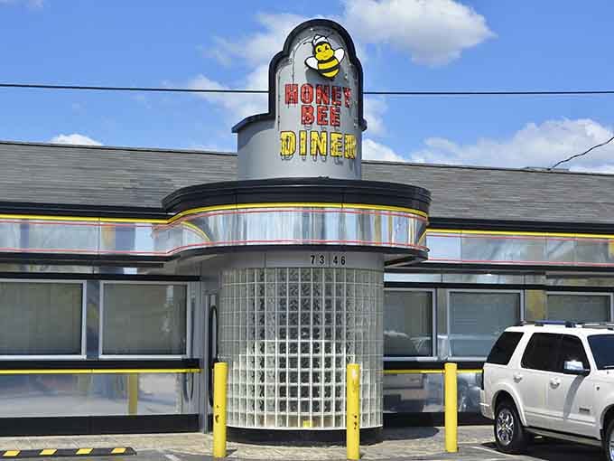 That gleaming chrome tower isn't just architecture, it's a beacon calling hungry travelers home to breakfast.