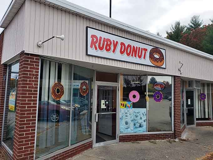 The playful window decals at Ruby Donut Shop announce your arrival at donut paradise in downtown Ayer.
