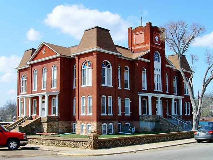This architectural beauty has watched over Doniphan for generations, its clock tower marking time while the town below evolved around its steadfast presence.