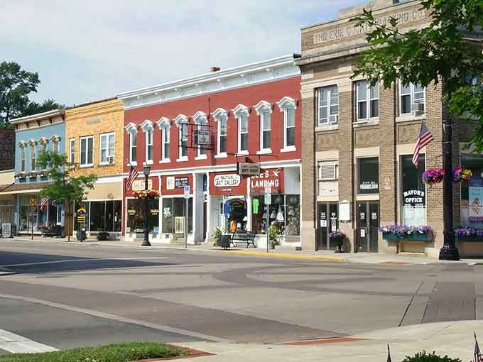 Shops line the streets where trees outnumber cars, proving some people figured out life early.
