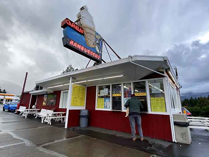 Even on a cloudy day, that neon ice cream cone shines like a beacon of hope and happiness.