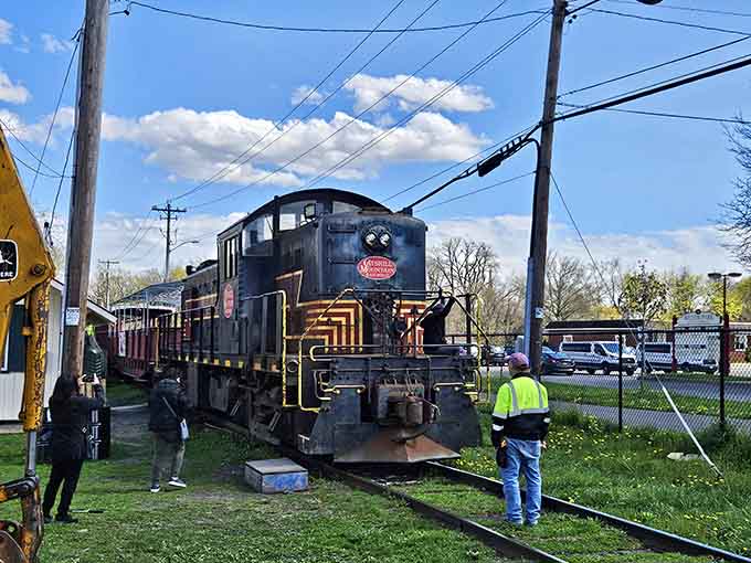This beautifully restored engine stands ready to carry passengers back to a simpler, more scenic era of travel.
