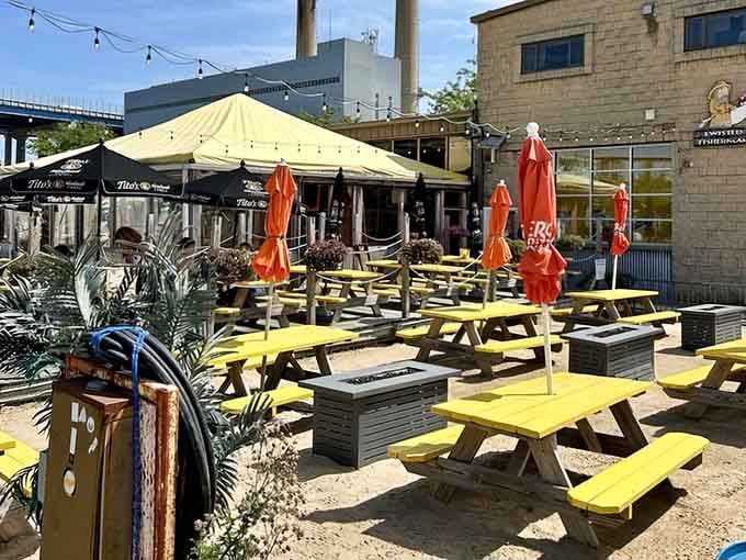Yellow picnic tables and orange umbrellas create a beachside fantasy that somehow makes perfect sense in Milwaukee.