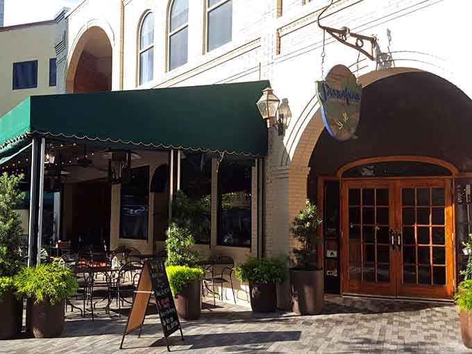 That turquoise awning isn't just pretty, it's a beacon guiding you to some seriously good Southern cooking.