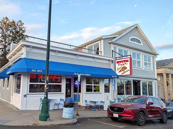 The iconic sign glows like a beacon for anyone who's ever craved a truly legendary slice of pizza.