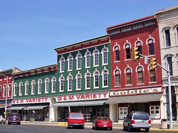 These colorful storefronts look like someone decided Main Street America deserved its own rainbow coalition.