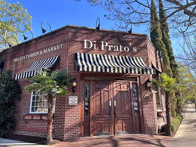 That classic brick facade with striped awnings isn't just charming, it's your beacon to pimento cheese paradise.