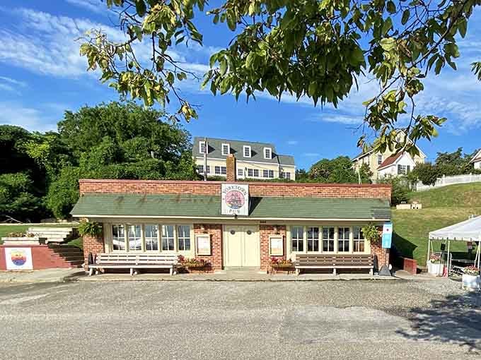 That brick facade and gravel parking lot are your first clue that something special awaits inside this Yorktown gem.