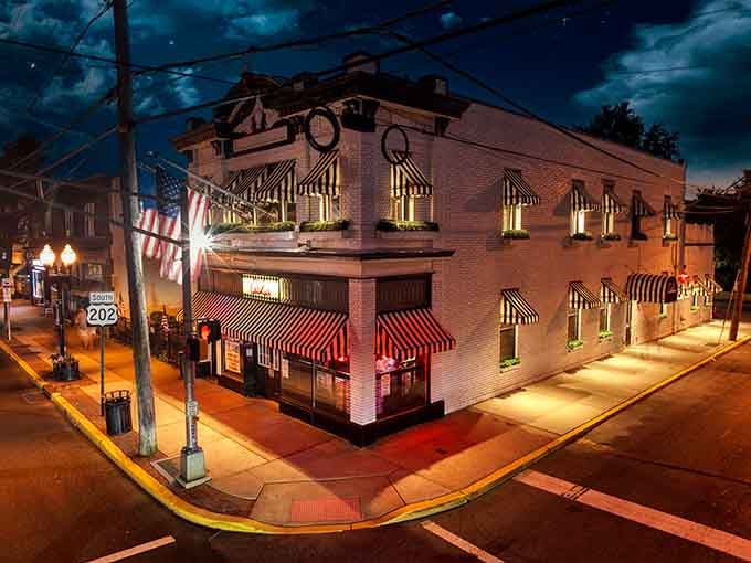 That corner glow at twilight says "come in, we've been waiting for you with perfectly cooked steaks and cold drinks."