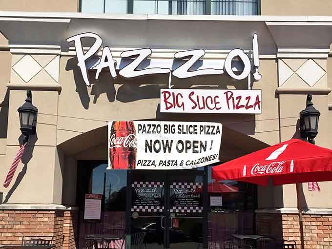 The exterior welcomes you with Coca-Cola umbrellas, because you'll definitely need something to wash down that pizza.