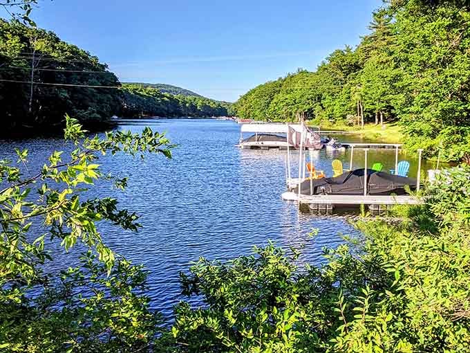 Private docks dot the shoreline like perfectly placed punctuation marks in nature's love letter to relaxation.