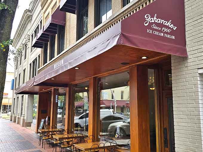 That burgundy awning on Washington Street is your beacon to a sweeter era, where ice cream parlors were palaces.