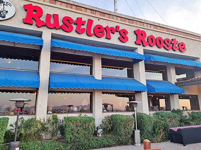 That blue awning beckons like a beacon of beef and Western dreams perched high above the valley.