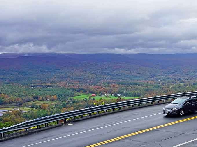 The trail winds through communities where fall colors compete for attention like nature's own fireworks display.