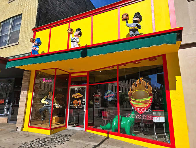 Those cartoon burger characters perched on the awning look happier than most people on their wedding day, and honestly, same energy.