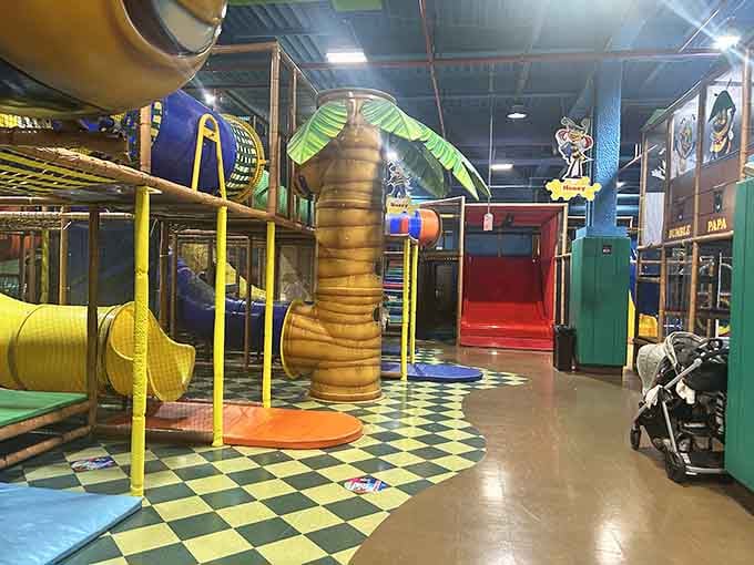 That palm tree structure isn't just for show, it's the gateway to climbing adventures your kids will brag about for weeks.