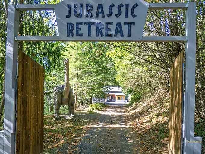 The dappled sunlight through towering trees creates the perfect prehistoric atmosphere as you approach this remarkable retreat.
