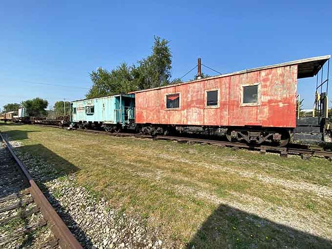 These weathered cabooses have seen more miles than your uncle's road trip stories, and they're not done yet.