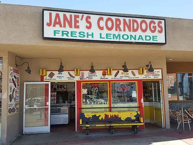 That cheerful bench outside is where locals have been waiting for corn dog perfection since Eisenhower was president.