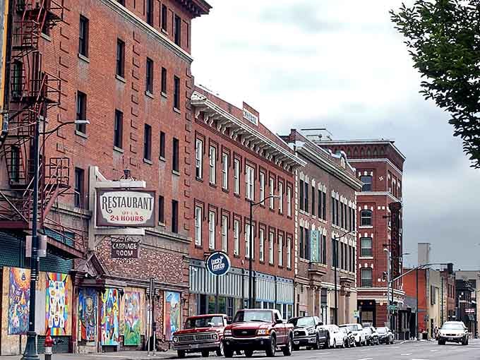 Historic brick buildings line downtown streets where character costs less than a Seattle parking spot.