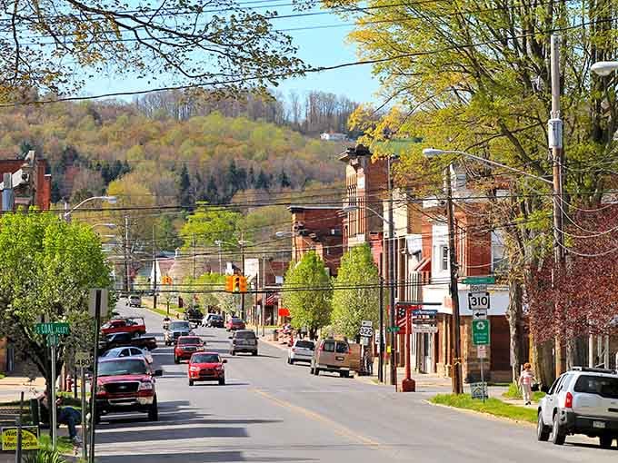 Main Street Reynoldsville stretches out like a postcard from simpler times, where brick buildings still mean something.