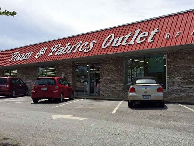 That distinctive red roof isn't just for show&mdash;it's basically a beacon calling all fabric enthusiasts to crafting paradise.