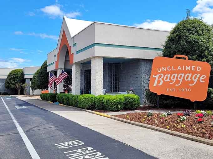 The iconic orange suitcase sign welcomes treasure hunters to Alabama's most unusual shopping destination where adventure awaits inside.