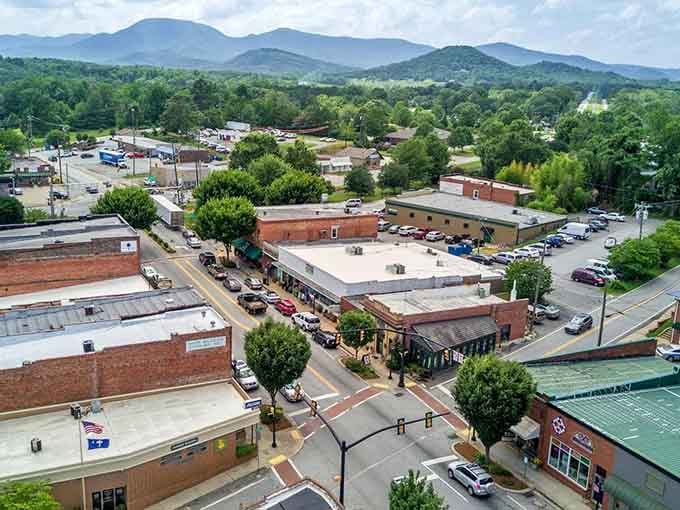 Downtown Landrum from above looks like someone carefully arranged a collection of vintage building blocks against mountain scenery.