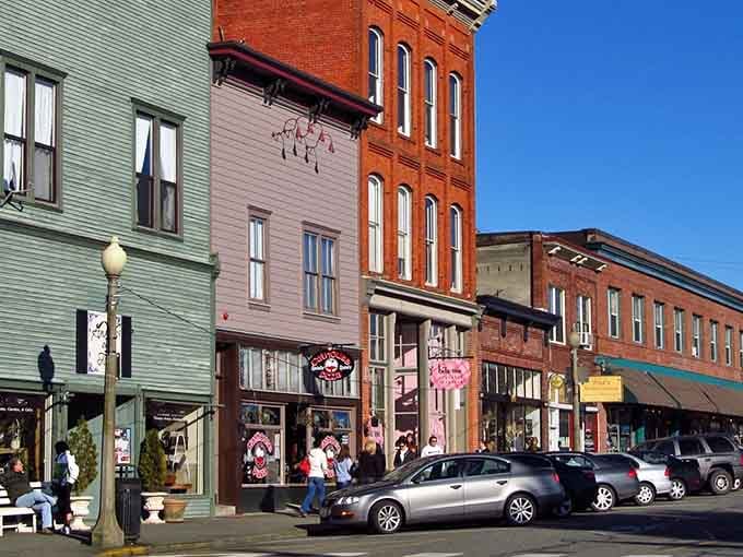 Historic buildings painted in cheerful hues line the streets like a rainbow of possibilities for antique hunters.