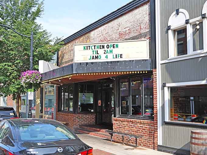 Classic brick facade with twinkling lights creates that perfect "let's grab a drink here" vibe you can't resist.
