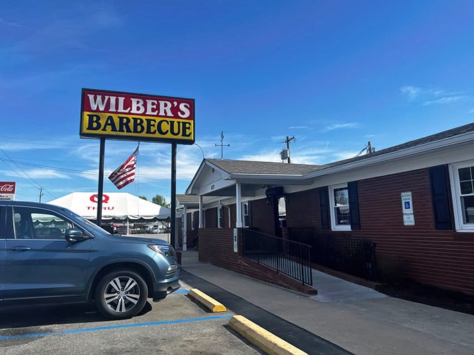 That sign isn't just advertising barbecue, it's broadcasting a promise that's been kept since the sixties.