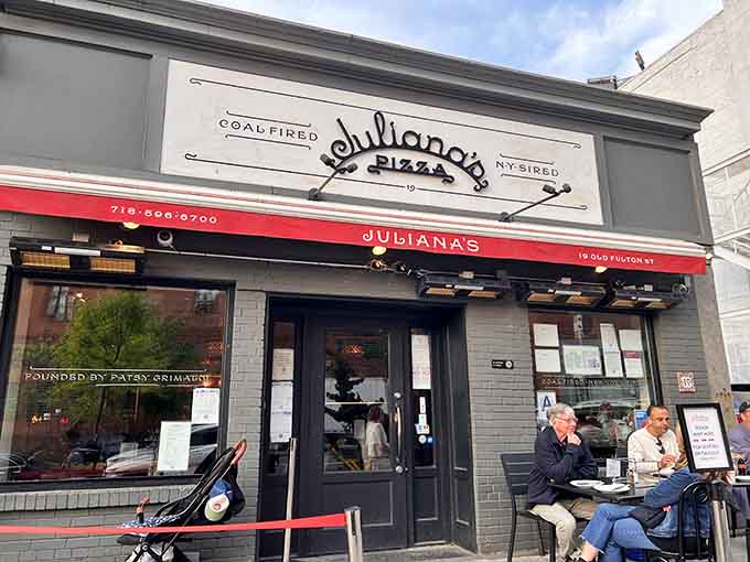 That red awning beckons like a lighthouse for hungry souls navigating the Brooklyn waterfront.