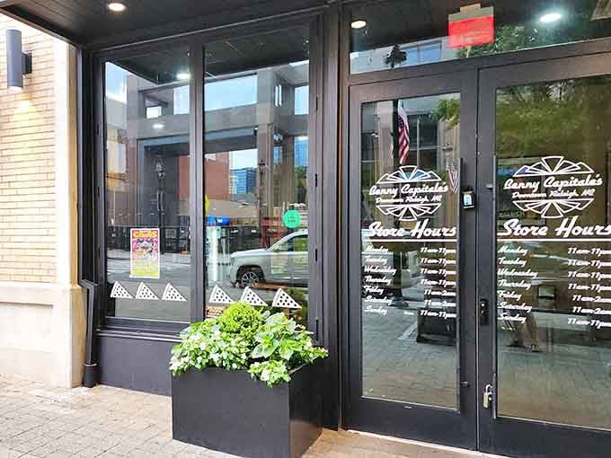 Those glass doors are your portal to pizza paradise, where normal-sized pies go to feel inadequate about themselves.