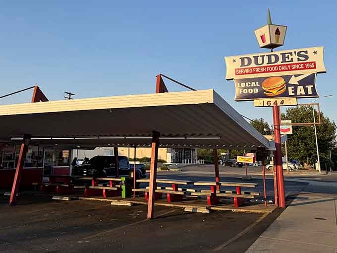 That vintage sign isn't just pointing you toward food; it's pointing you toward happiness with a side of nostalgia.