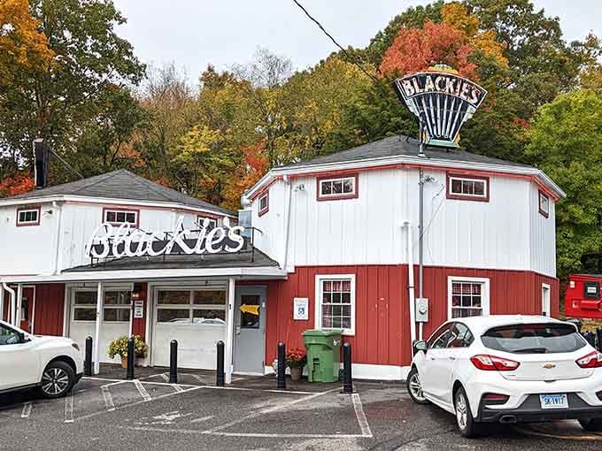 The iconic Blackie's sign stands tall like a lighthouse guiding hungry souls to steamed perfection since the Jazz Age.